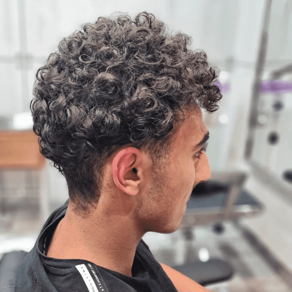 30 Trendsetting Haircuts For Men's Curls