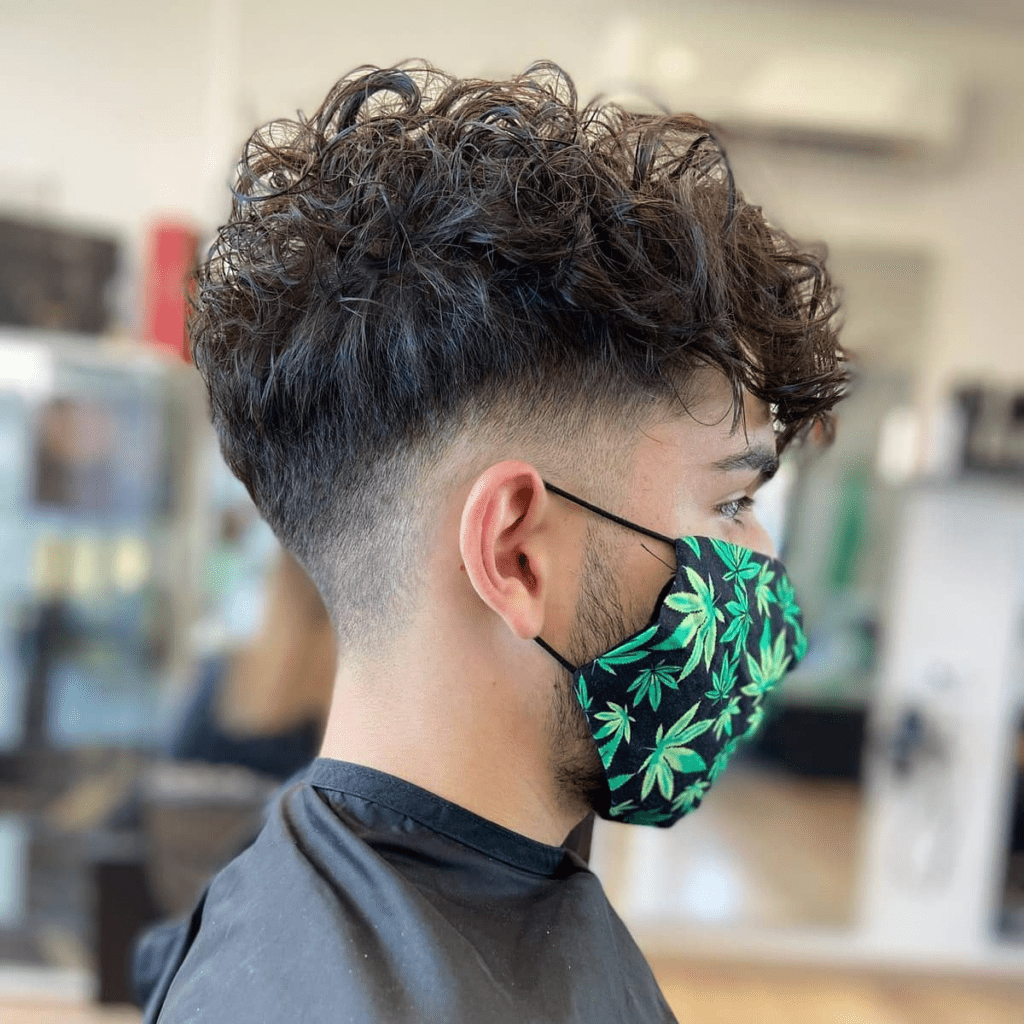 30 Trendsetting Haircuts For Men's Curls